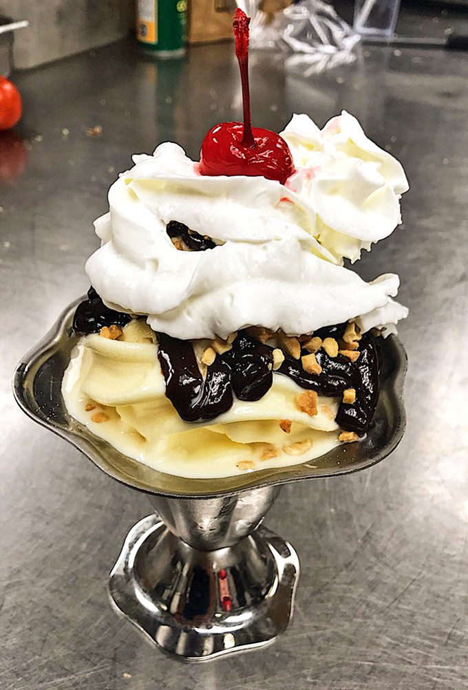 This hot fudge sundae isn't dessert; it's performance art with a cherry on top. The whipped cream alone deserves a standing ovation.