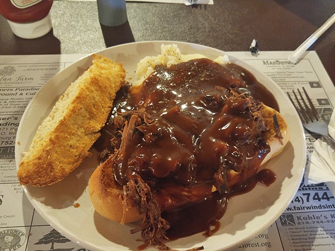 This hot roast beef sandwich smothered in gravy represents comfort food at its most soul-satisfying and indulgent peak.