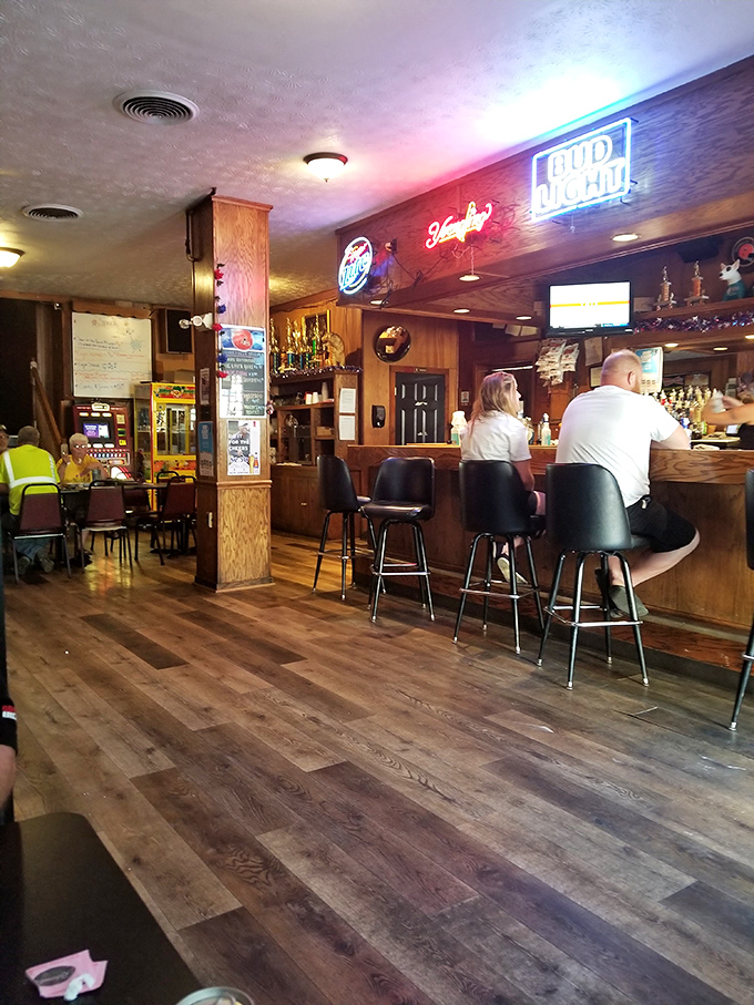 Where stories are shared and friendships forged—wooden floors, comfortable seating, and the warm glow of neon create Cameo's timeless atmosphere.