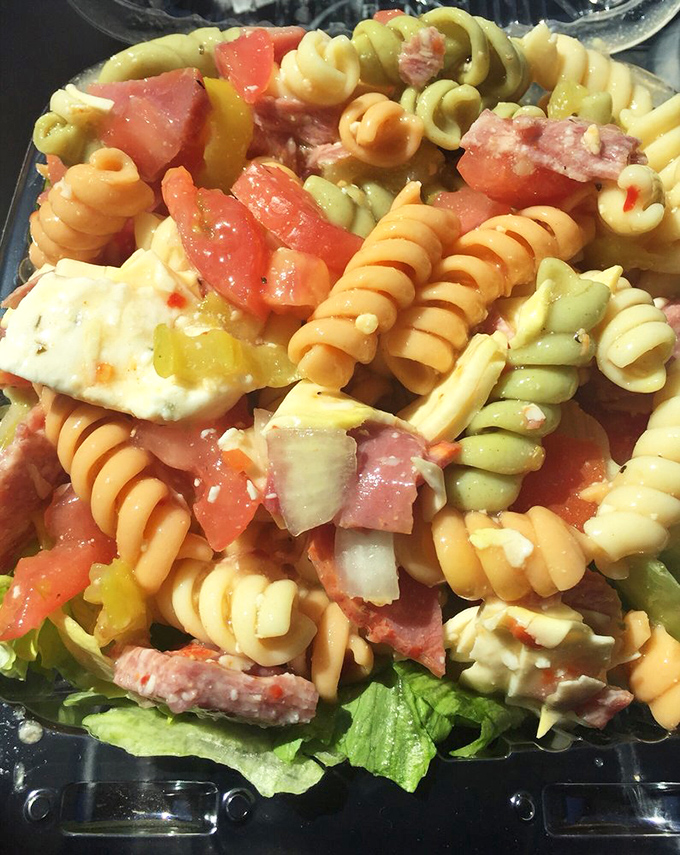Pasta salad that doesn't apologize for being colorful. A riot of textures and flavors that puts those sad deli counter versions to shame.