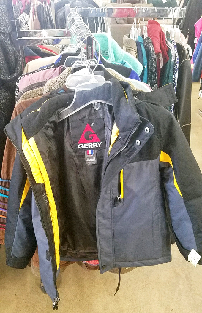 Quality outerwear hanging patiently, ready to keep someone warm through Oregon's unpredictable weather patterns.