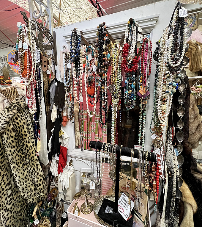 A dazzling cascade of vintage costume jewelry awaits its next glamorous outing. Every necklace tells a story of evenings long past.