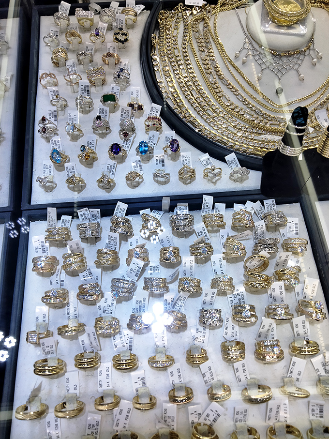 Jewelry displays sparkling like a dragon's hoard, minus the fire-breathing guardian but with equally fierce prices.
