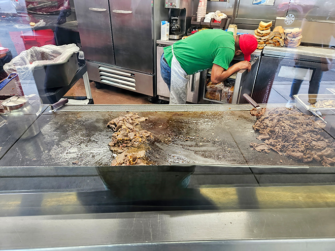 The battlefield where cheesesteak legends are born. That griddle has more seasoning than most restaurants have in their entire spice rack.