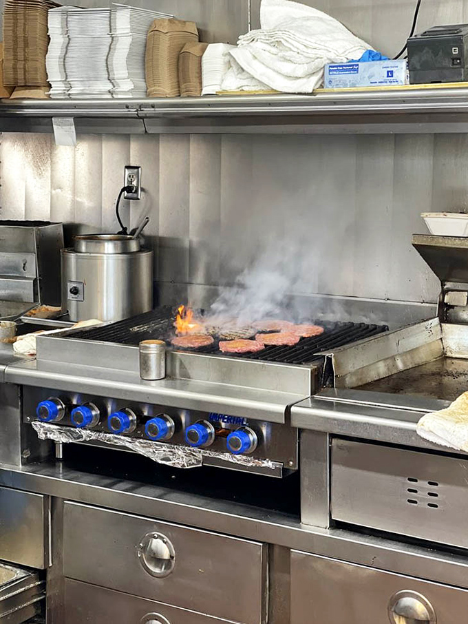 Watch the breakfast ballet unfold as skilled cooks work their morning magic on commercial grills with decades of practice.