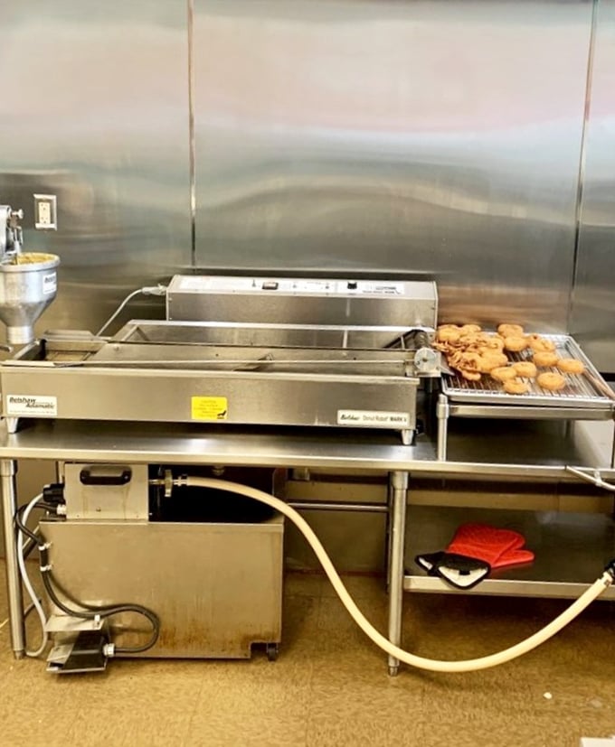 Where the magic happens&mdash;a donut assembly line that would make Henry Ford weep tears of sugary joy.