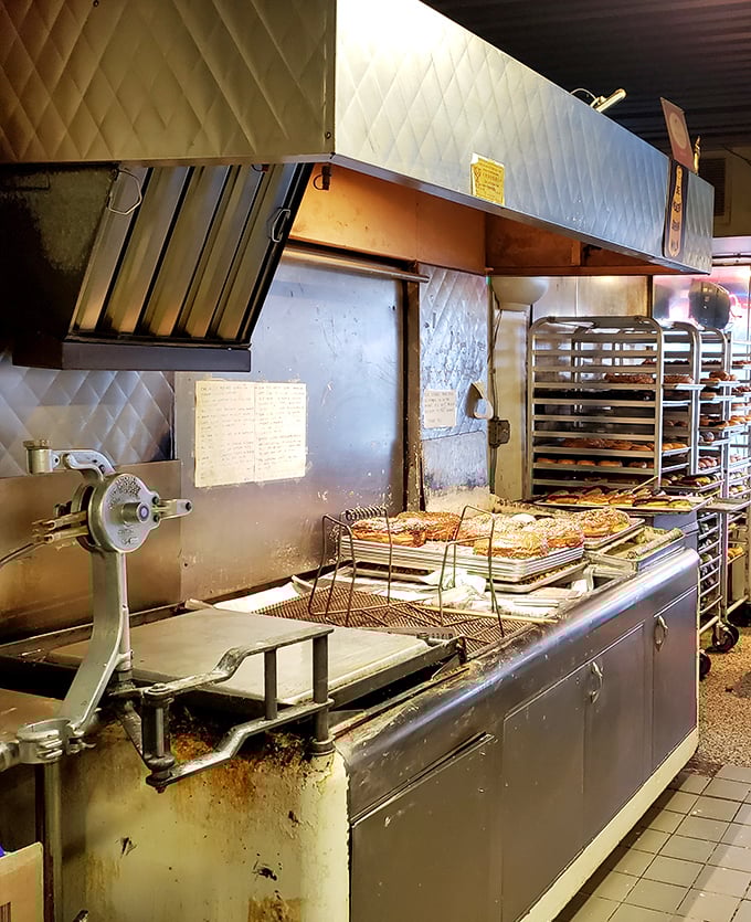 The kitchen's well-worn equipment tells stories of countless batches, revealing that donut-making isn't just cooking &ndash; it's industrial-strength magic.