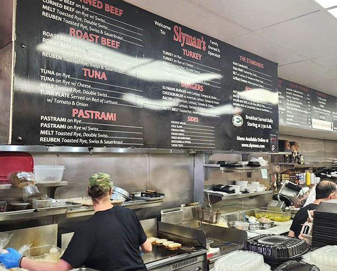 Behind the scenes, sandwich artisans work their magic. The kitchen may lack pretense, but the results speak volumes about their dedication to deli perfection.