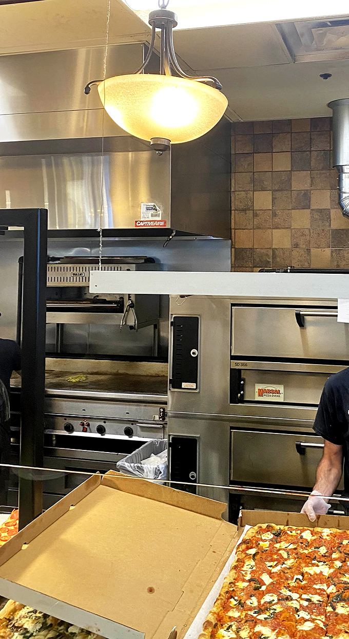Behind the scenes magic where dough becomes destiny. The pizza oven isn't just equipment&mdash;it's the beating heart of Altomonte's culinary operation.