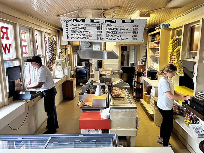 Behind-the-scenes efficiency in action. The kitchen ballet that's been choreographed to perfection over decades of service.