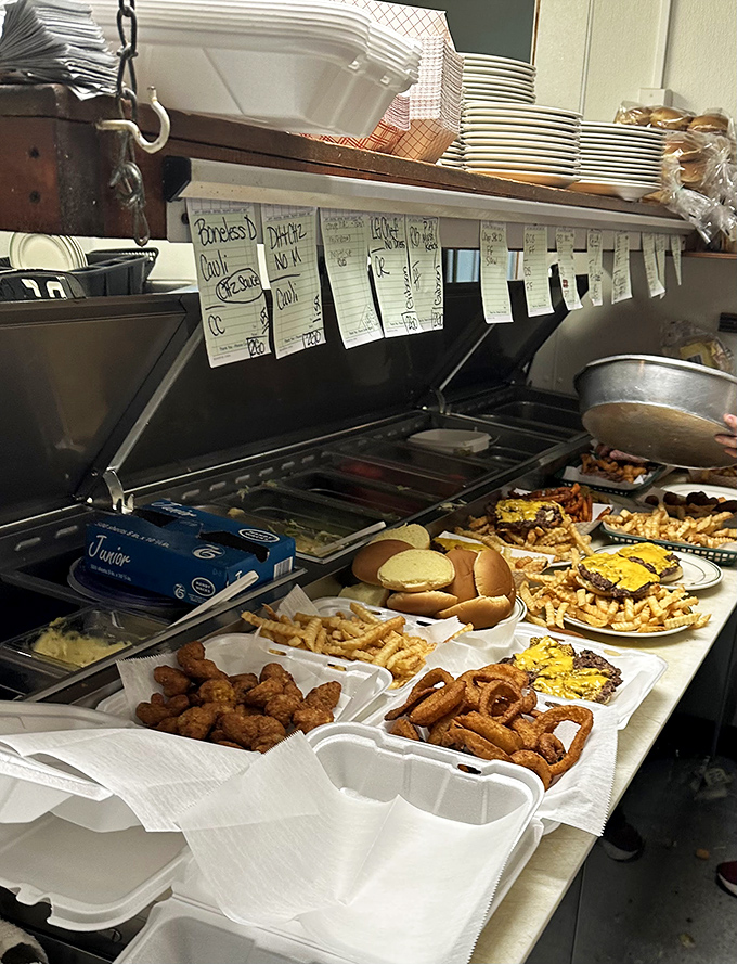A glimpse into the kitchen reveals the organized chaos where Rod's magic happens&mdash;handwritten tickets and plates ready for hungry patrons.
