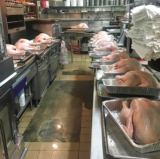 Behind the scenes, the kitchen prepares for battle with an army of prime rib roasts standing at attention, awaiting their moment of glory.