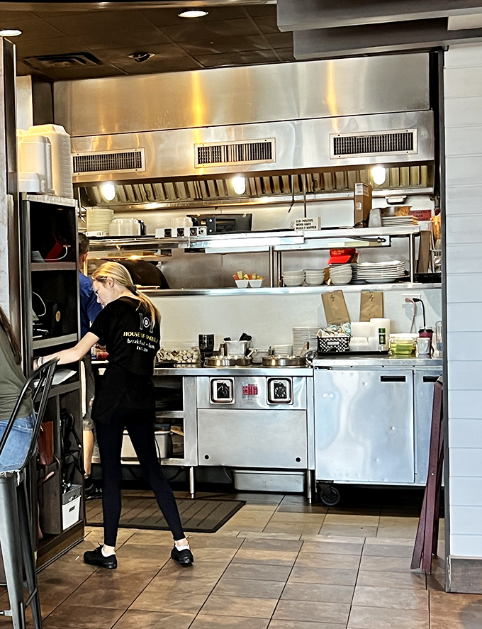 Behind the scenes, the kitchen orchestra plays its morning symphony of sizzles and pops.