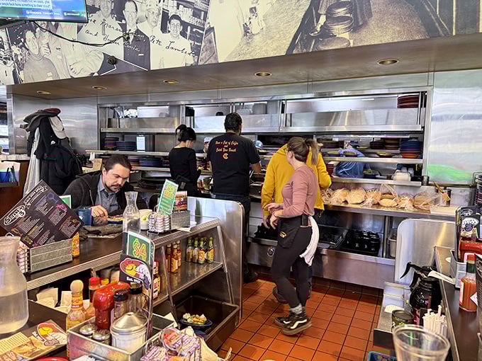 Where the magic happens: Sam's bustling kitchen operates with the precision of a Swiss watch and the soul of a jazz quartet.