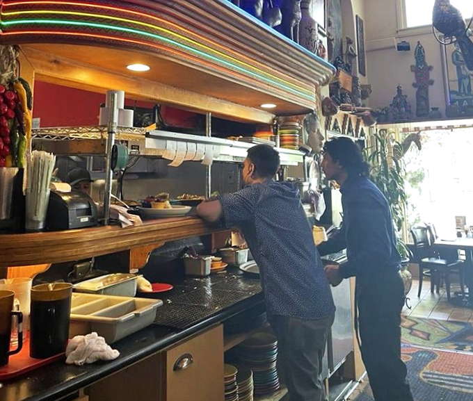 Behind the scenes magic happens at the pass, where global cuisines emerge from a kitchen that somehow masters dishes from six continents.