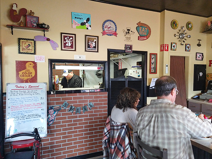 A glimpse into the kitchen—where breakfast magic happens behind a brick facade and watchful rooster guardians.