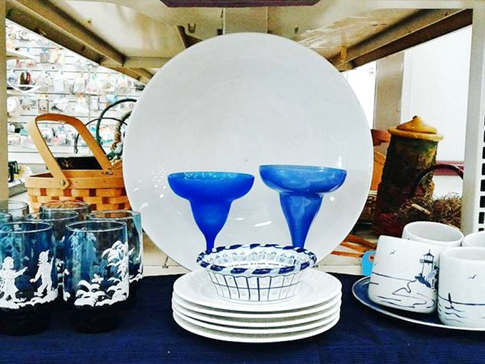 White plates and cobalt blue glasses create a nautical tablescape waiting to happen. Martha Stewart would approve of this thrifty dining collection.