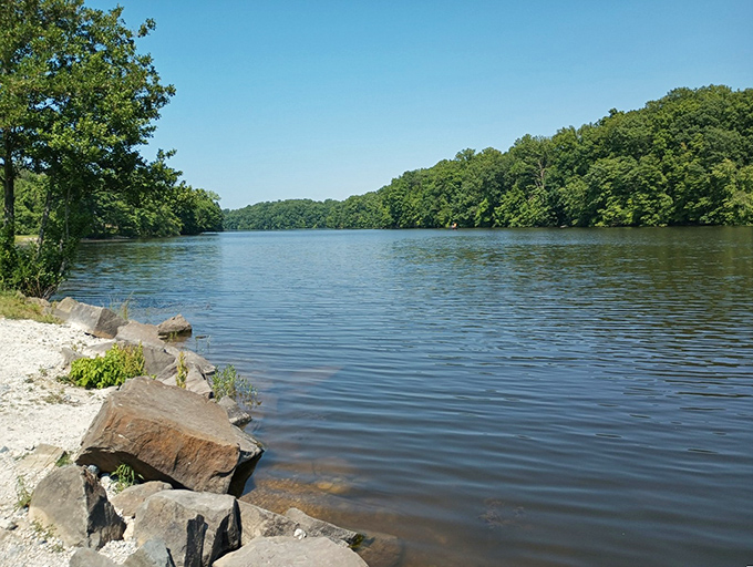 The lake's edge offers a front-row seat to nature's best performance &ndash; the gentle meeting of water, stone, and forest.