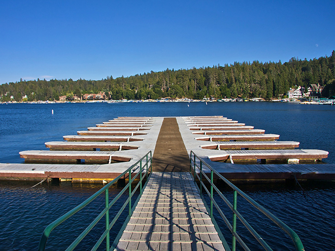 The symmetrical perfection of Lake Arrowhead's boat dock stretching into sapphire waters. Geometry has never looked so inviting.