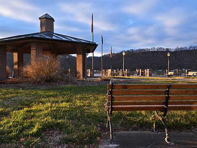 Lamplighter Park's simple bench offers contemplation with a view. Sometimes the best luxury is just sitting still while watching the Ohio River roll by.