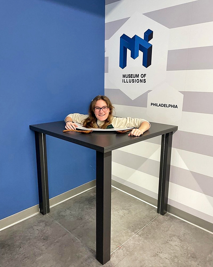 The optical illusion that makes normal-sized people look like they raided Jack's beanstalk.