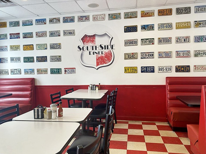 License plates from across America create a road trip on the wall. Each one represents someone who probably said, "We have to come back here."