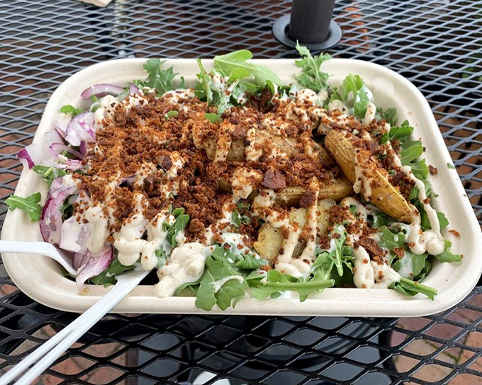 This loaded potato bowl looks like it was designed by someone who understands that "restraint" is just a word in the dictionary, not a cooking philosophy.