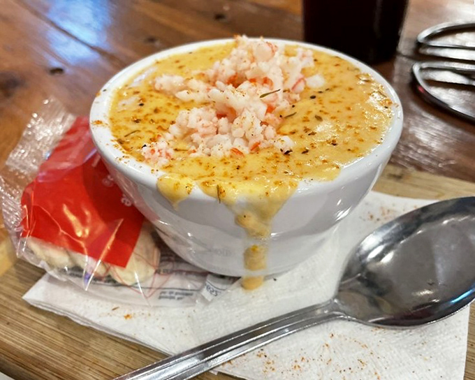 This lobster bisque isn't just soup &ndash; it's a warm, creamy hug from the ocean, topped with tender morsels of its main attraction.