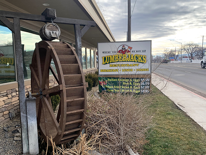 Lumberjacks Restaurant embraces its mountain heritage with rustic charm and a water wheel that's more functional than your average lawn ornament.