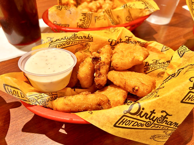 Golden-fried mac and cheese bites with ranch dipping sauce—because sometimes you need your comfort food to wear armor.