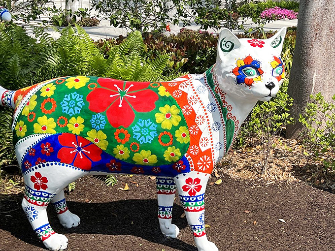 A folk-art inspired feline that would make Frida Kahlo proud. The floral pattern transforms this cat into a walking garden.