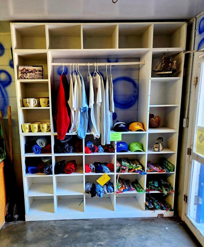 Even the merchandise display maintains the laid-back vibe. T-shirts, hats, and souvenirs for those who want to take a piece of Old Florida home.