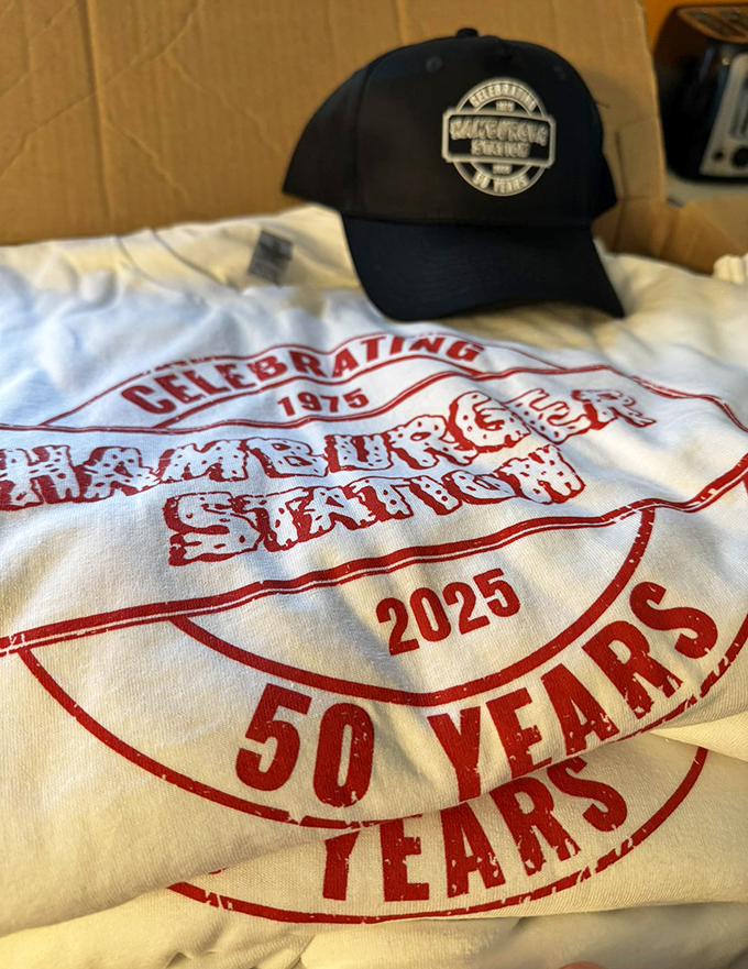 Fifty years of burger excellence celebrated in cotton and cap form. Some souvenirs you wear, others you taste for decades.