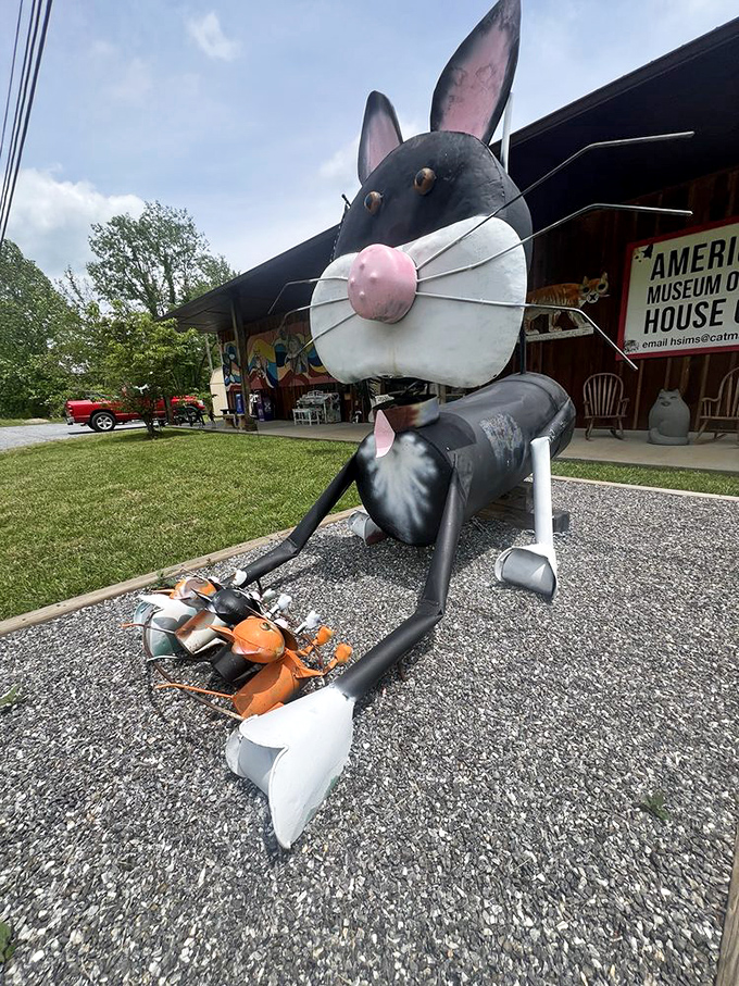 This metal cat sculpture guards the museum entrance with industrial charm. Recycled parts given new life as a feline sentinel.