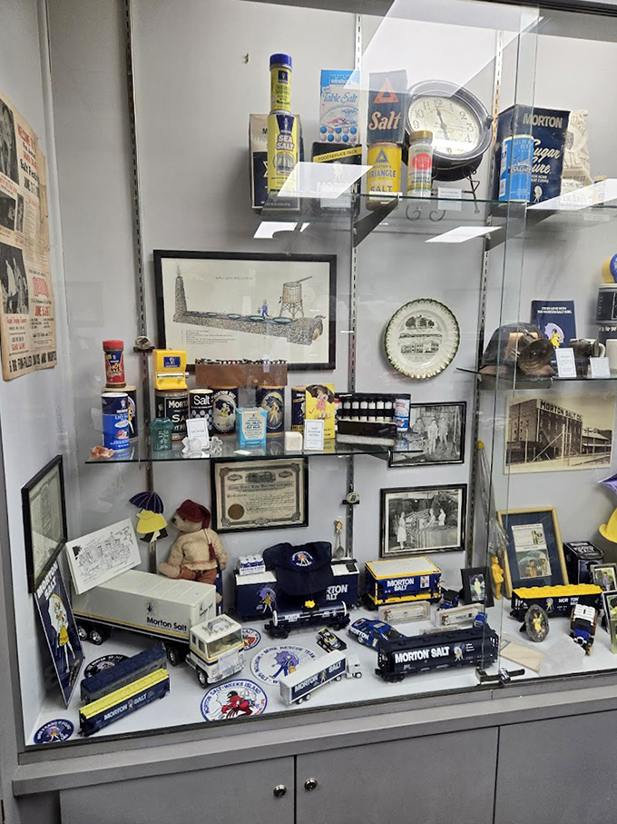 Morton Salt memorabilia fills this display case &ndash; tiny trucks carrying tiny salt that made a giant impact on American kitchens.