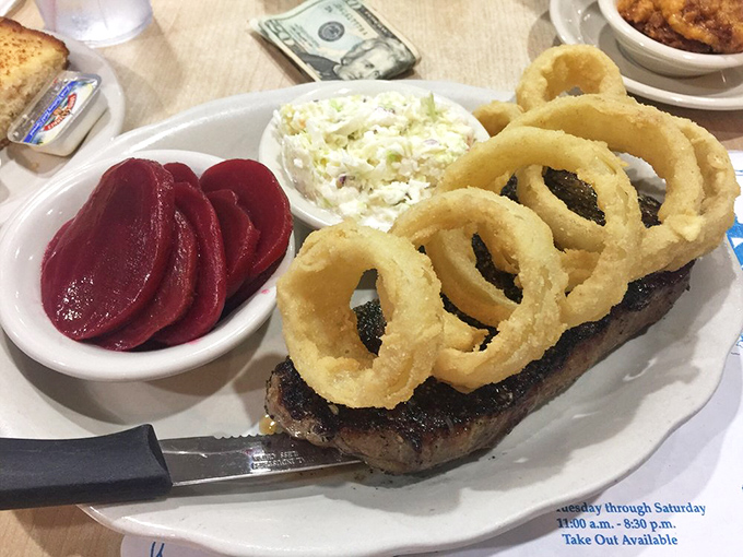 Even the steak gets the royal treatment, crowned with onion rings fit for seafood royalty. Those beets aren't just side dishes&mdash;they're ruby jewels.