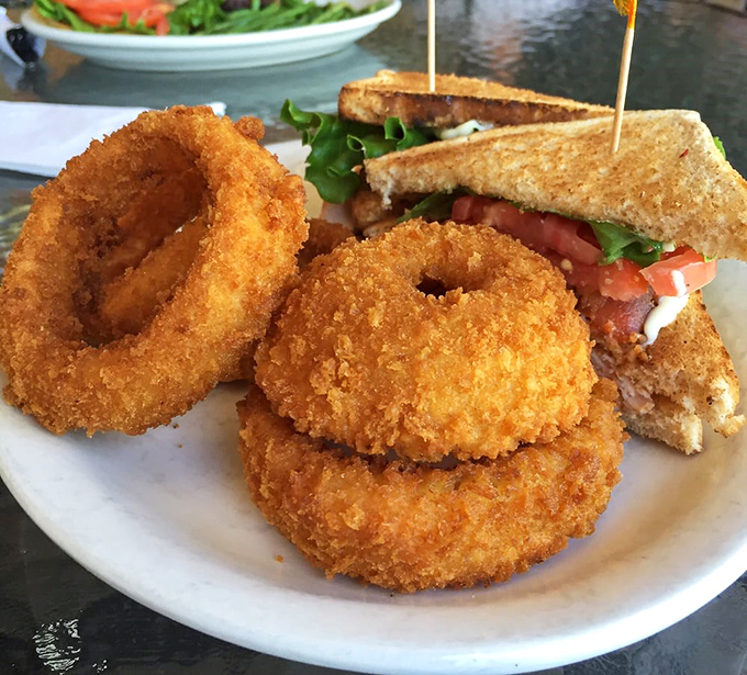 Onion rings with the perfect crunch-to-give ratio&mdash;the kind that make a satisfying sound when bitten into. Sandwich looking equally impressive.