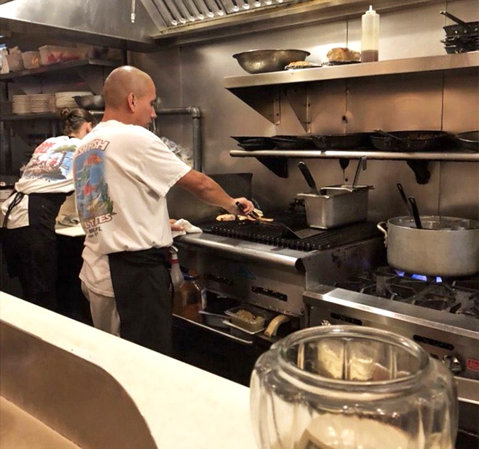 In the open kitchen, culinary magic happens without pretense &ndash; just skilled hands transforming fresh catch into masterpieces.