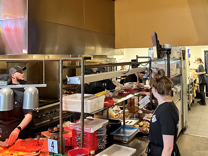 Behind the scenes where smoke meets meat—the kitchen that transforms simple ingredients into complex flavors through time and fire.