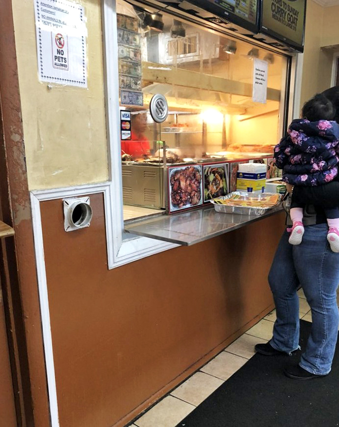 At this window, dreams come true in the form of perfectly packed to-go containers. The anticipation while waiting here is almost as delicious as the food.