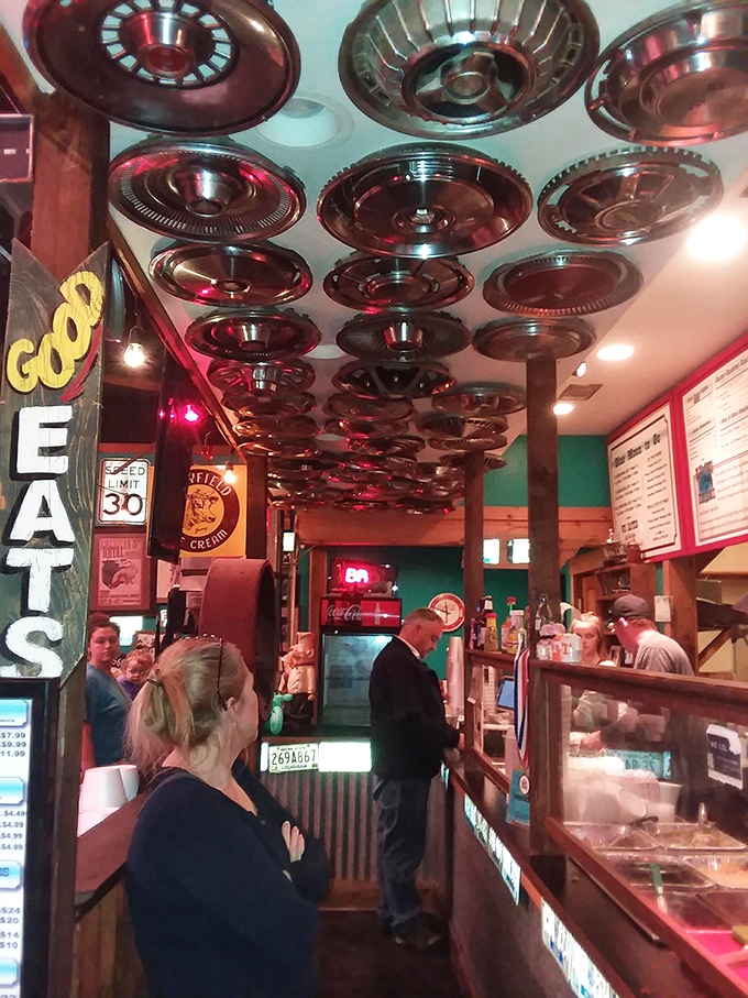 Where the magic happens: hubcap ceiling, menu boards, and staff who know exactly what you need before you do.