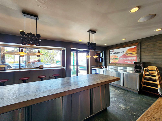 Modern deli design that balances form and function. The space invites you to stay while respecting that your relationship with their sandwich is primary.