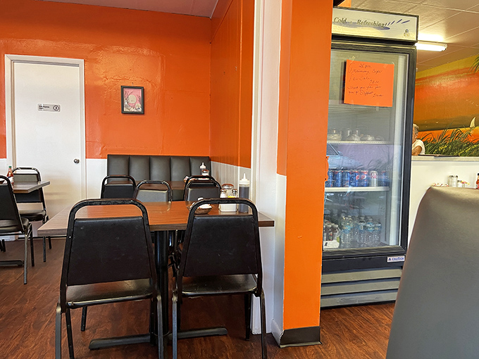 Simple tables against vibrant walls create the perfect canvas for breakfast memories. No distractions from the serious business of eating.