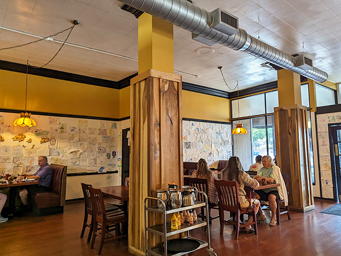 Exposed ductwork meets warm wood tones in a space where industrial chic shakes hands with mountain town comfort.