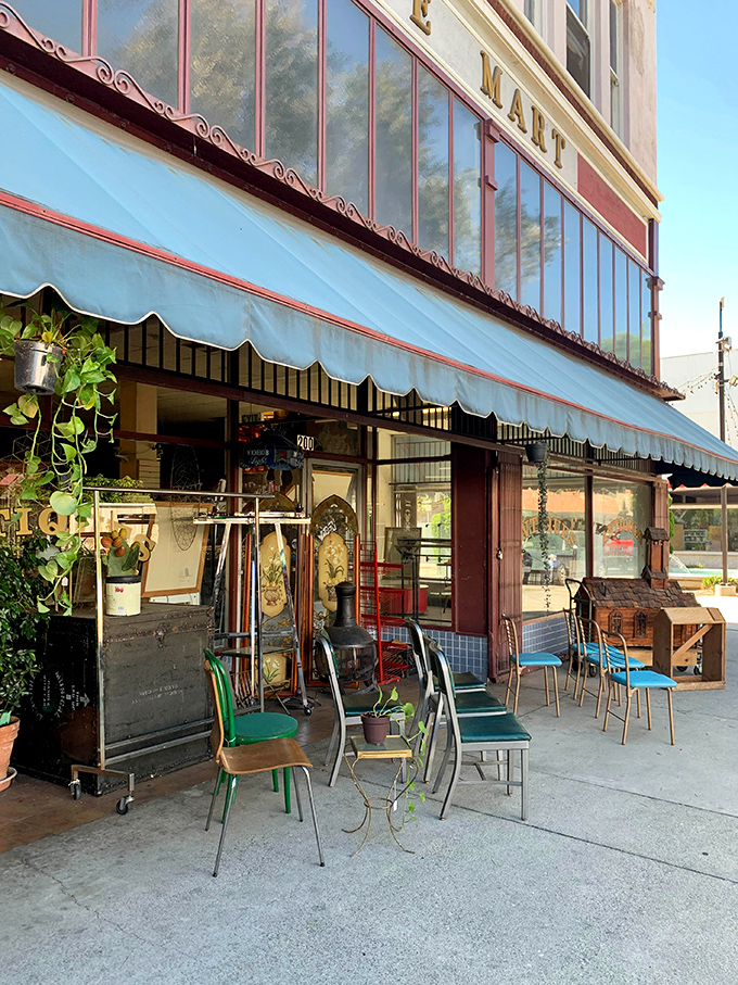 Even the sidewalk becomes a showroom where vintage charm spills onto the street like friendly hospitality.
