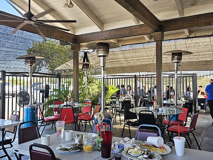 The outdoor patio offers al fresco dining with a side of California sunshine. Even the ceiling fans seem to be smiling at your excellent life choices.
