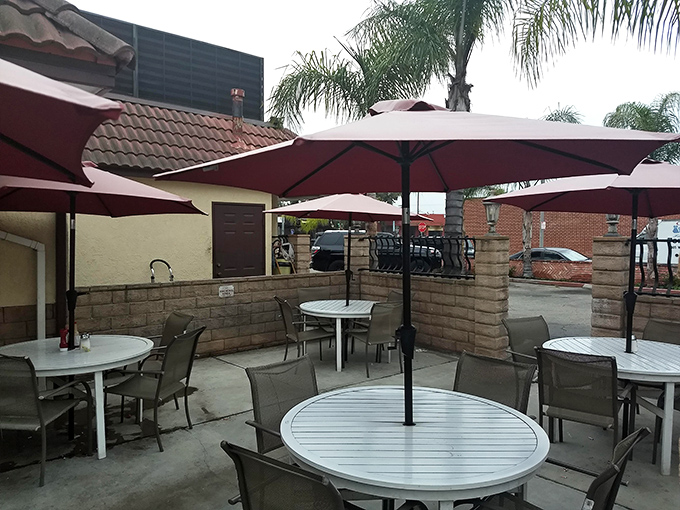 California dining as nature intended&mdash;outdoors under umbrellas. The patio offers fresh air with your fresh-cooked meal.