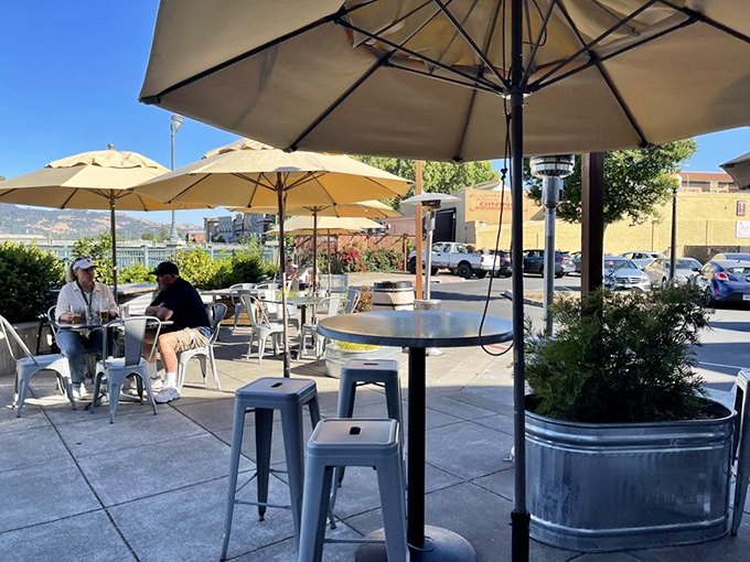 The outdoor patio offers al fresco dining with Napa sunshine, perfect for those who prefer their BBQ with a side of vitamin D.