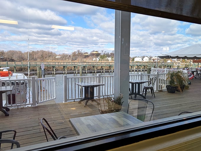 The waterfront view reminds you where your meal originated, creating that perfect circle of appreciation as you dine within sight of the bay's gentle waters.
