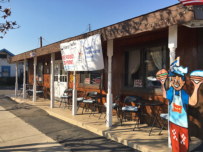 The outdoor setup isn't trying to impress anyone, which is exactly why it does. Simple tables where extraordinary flavors await beneath California skies.